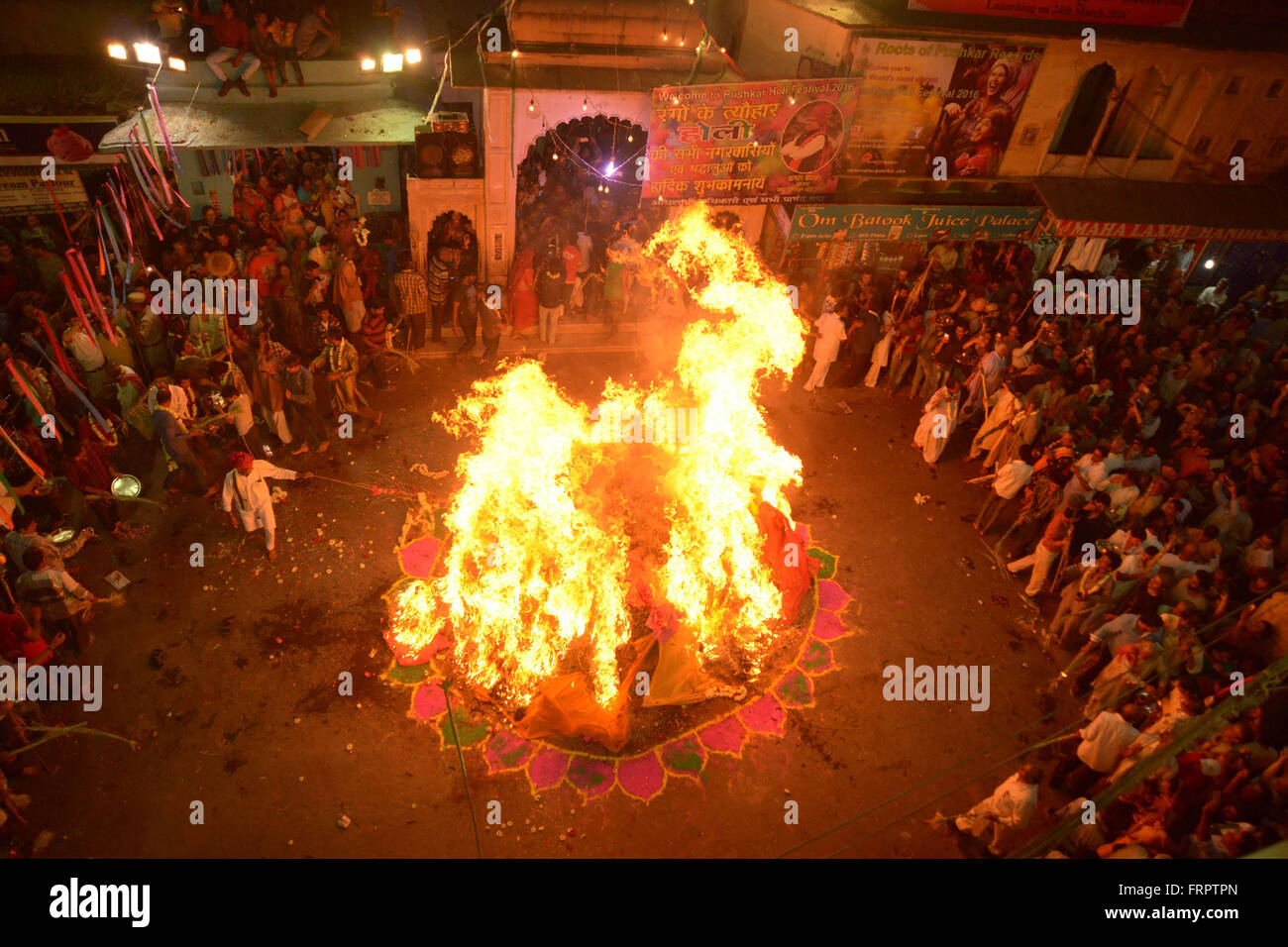 Pushkar, India. 23rd Mar, 2016. People performing Holika Dahan, also ...