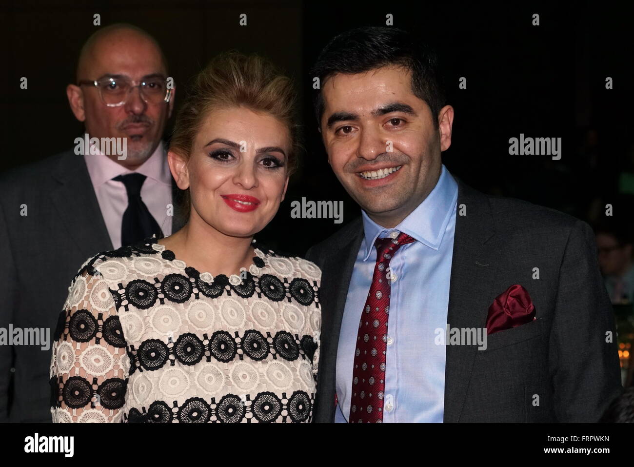 London, UK. 23th March 2016. Ibrahim Dogus and wife Raife Dogus attend ...