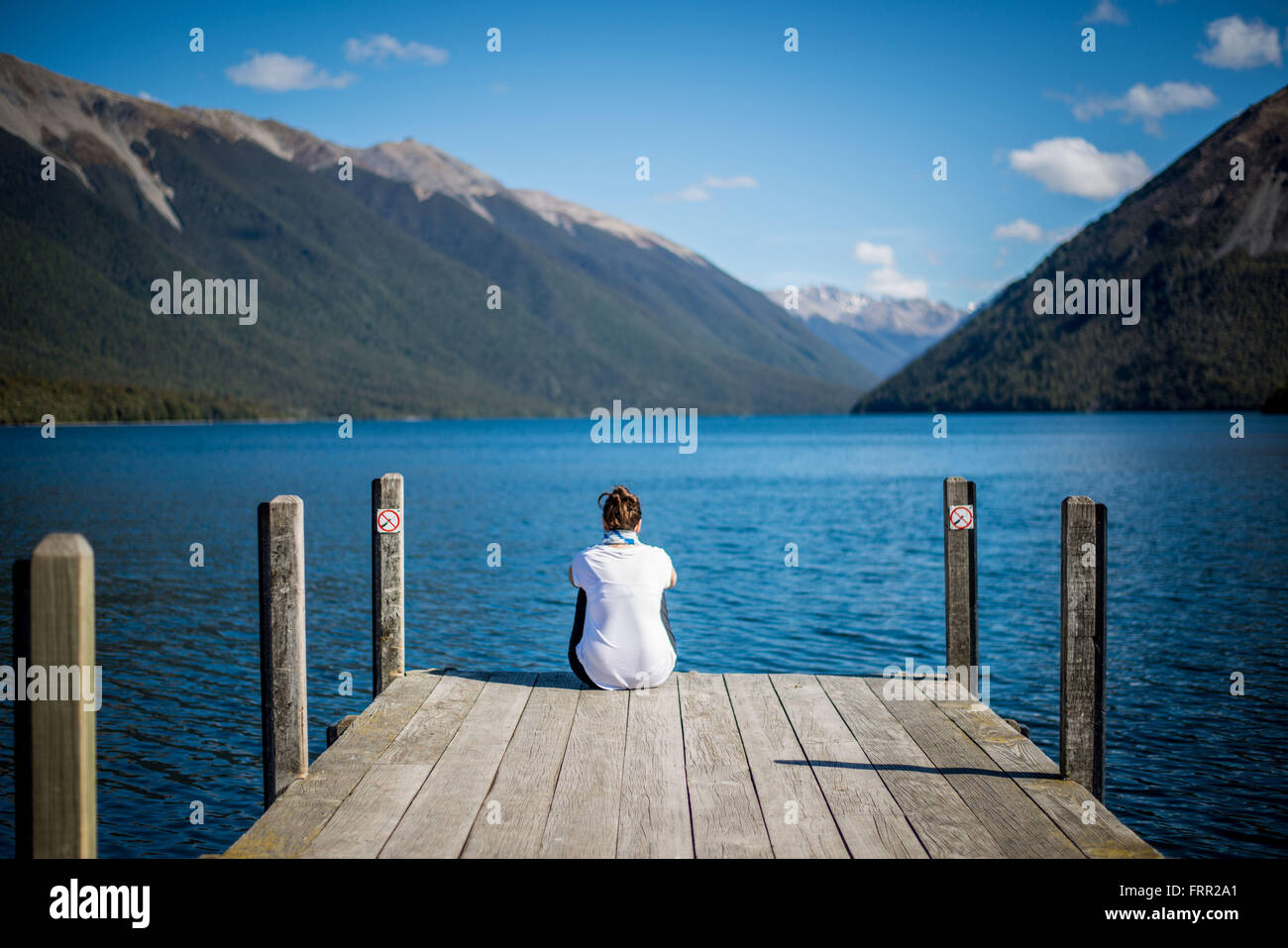Woman jetty new zealand hi-res stock photography and images - Alamy