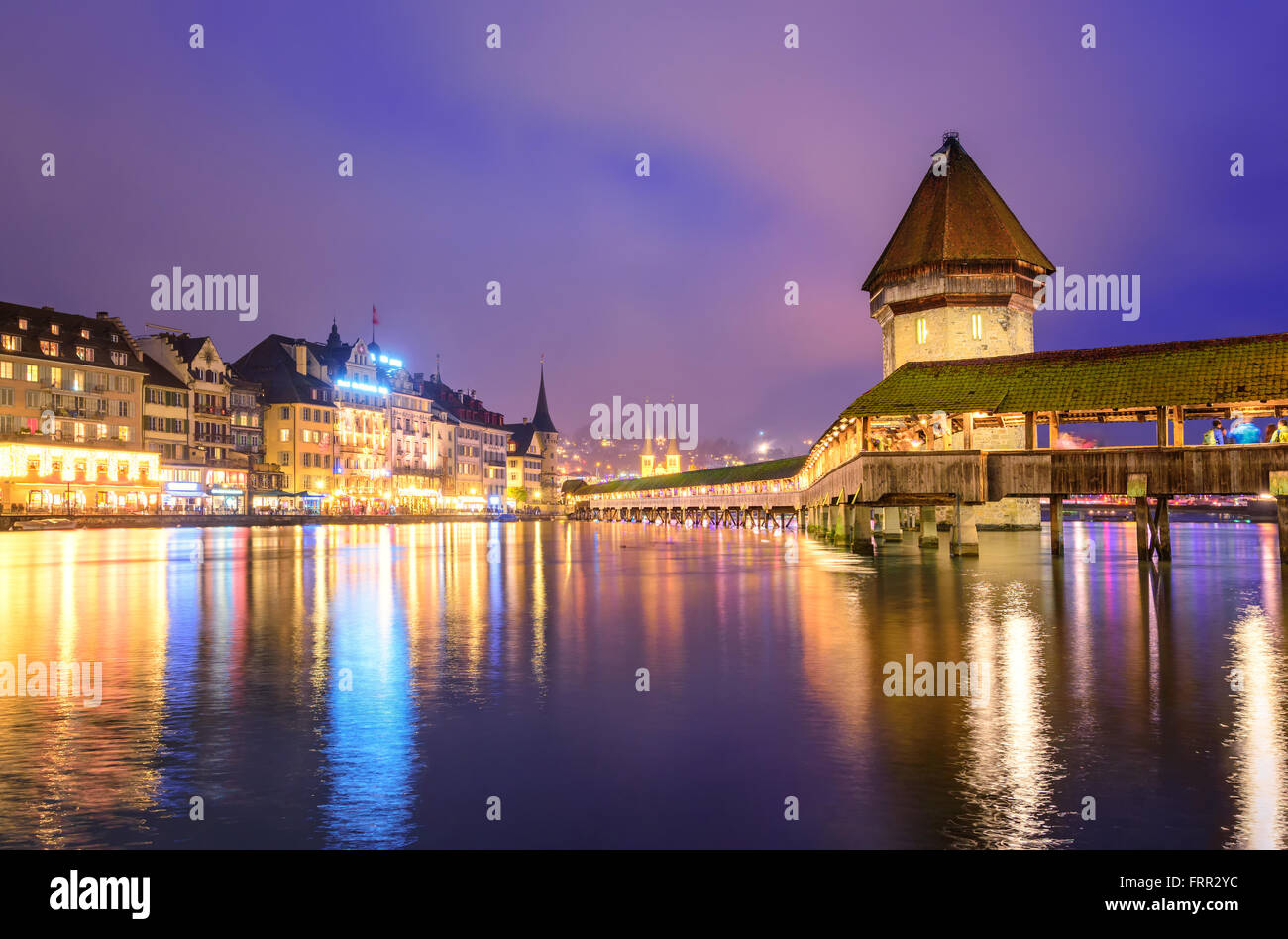 Lucerne, Switzerland, night view over the Reuss river to the wooden ...