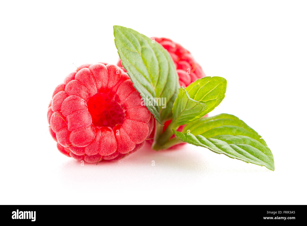 Raspberry fruit isolated over white background Stock Photo - Alamy