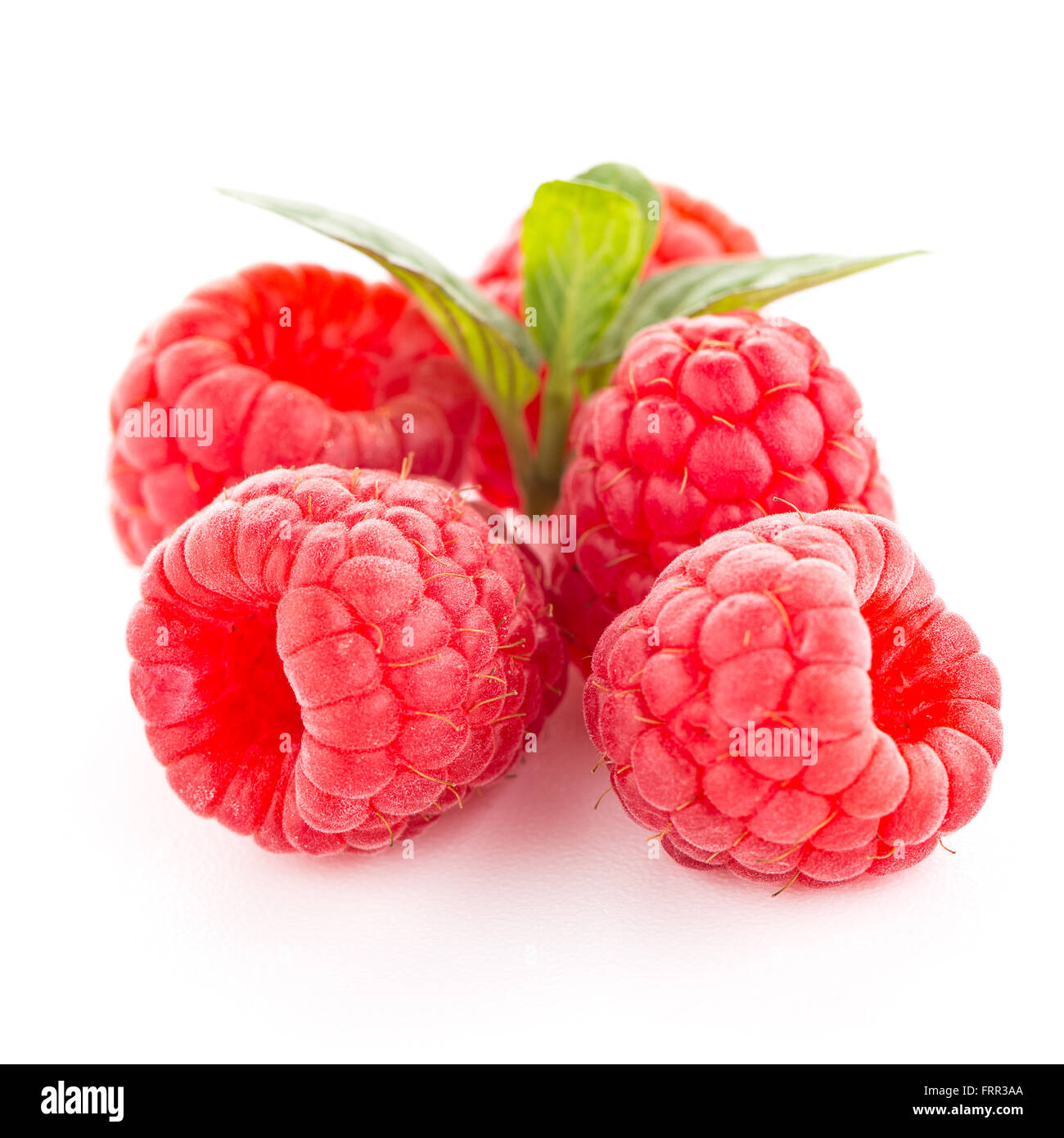 Raspberry fruit isolated over white background Stock Photo - Alamy