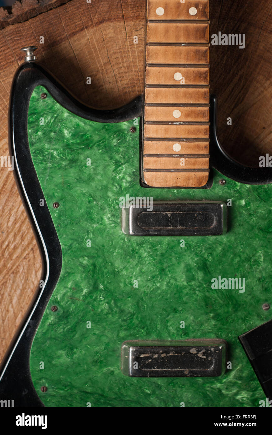 electric guitar without strings on wooden background, copy space Stock ...