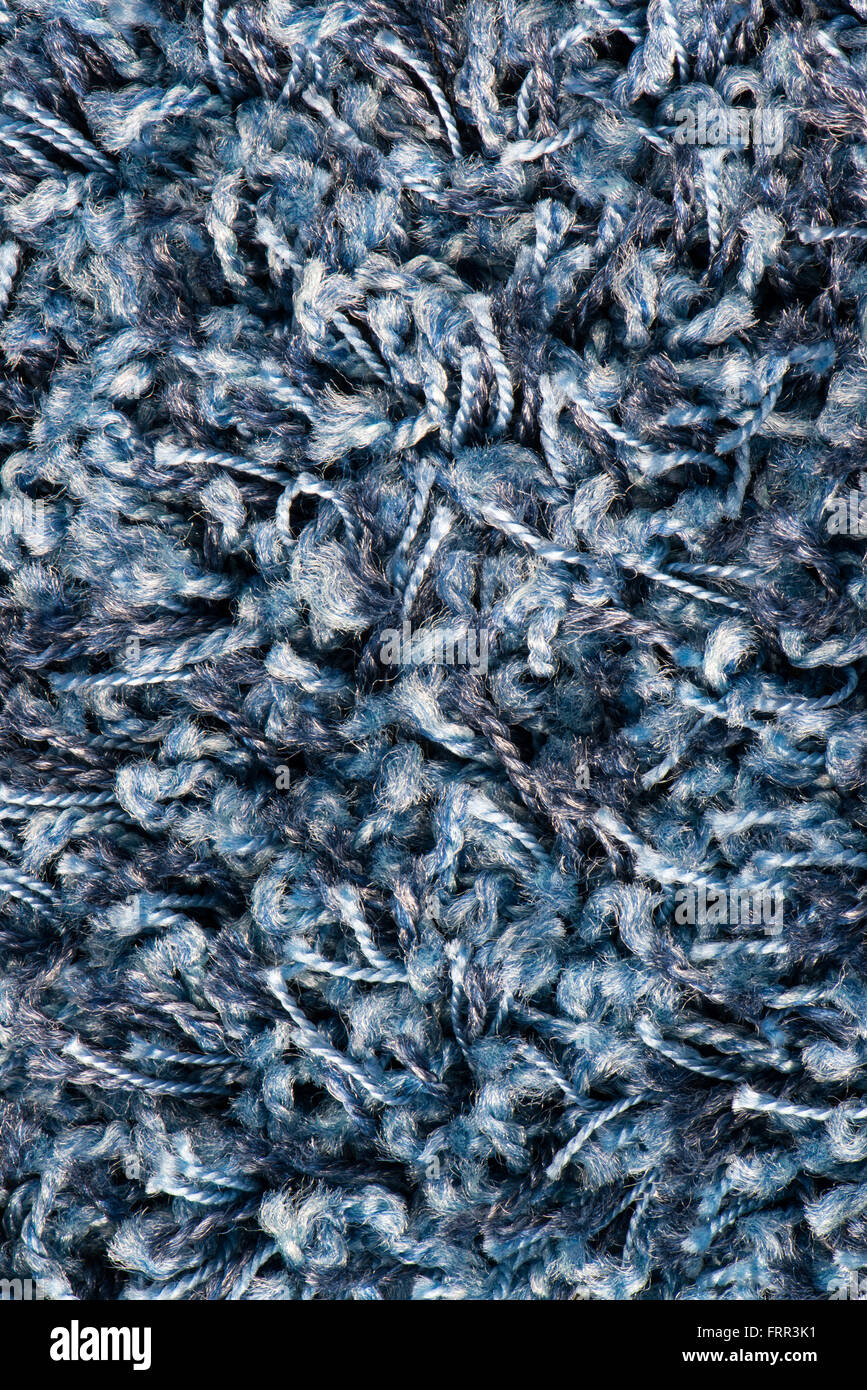 Closeup detail of blue carpet texture background Stock Photo - Alamy