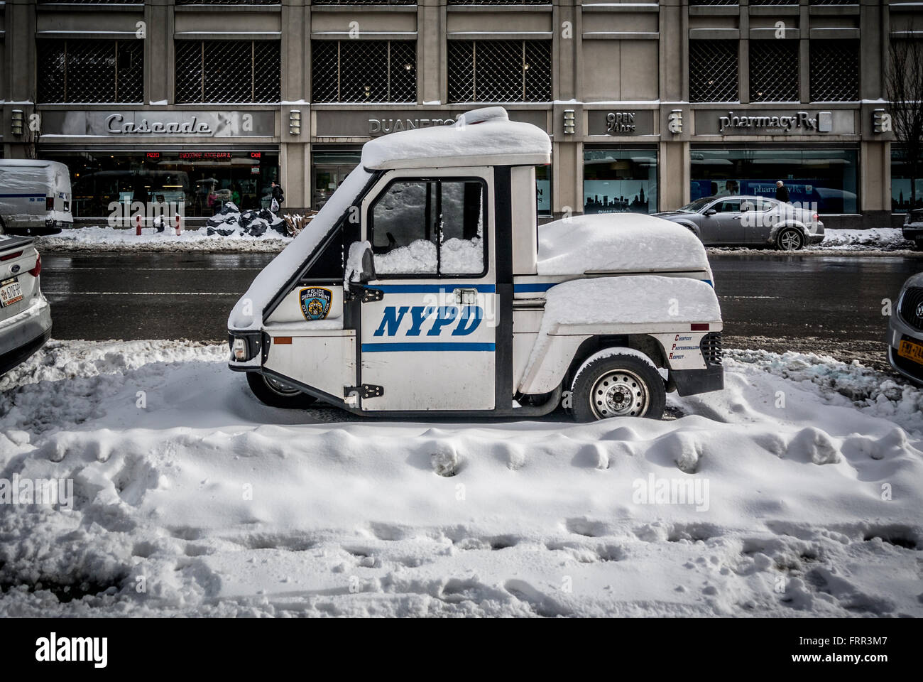 NYPD vehicle, New York City street in winter with snow, USA Stock Photo ...