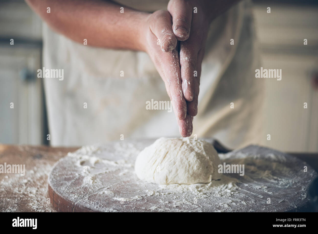 Man baking bread in the kitchen Stock Photo - Alamy