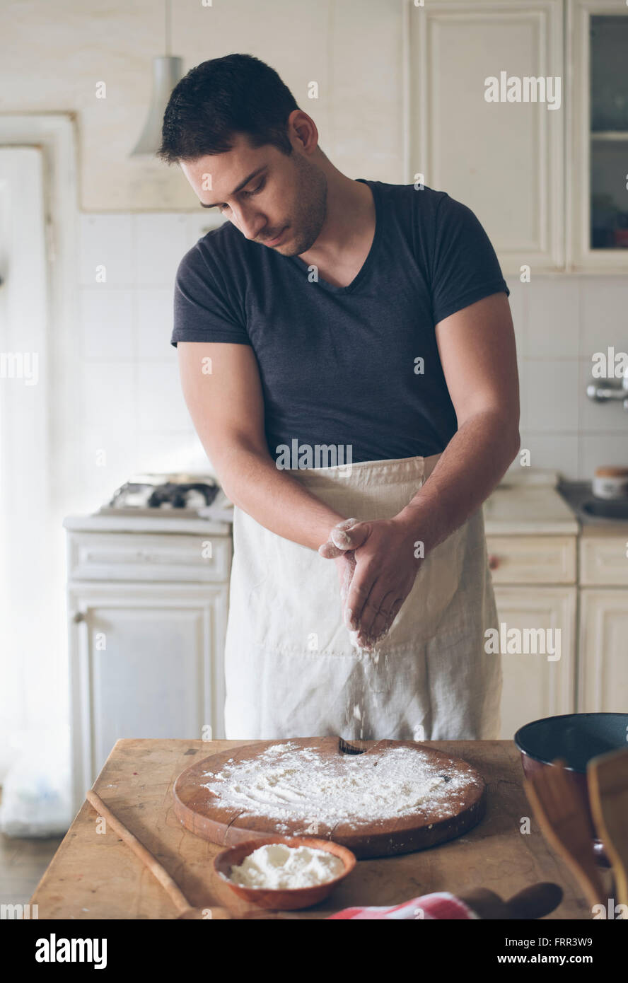 Man baking bread in kitchen Stock Photo - Alamy