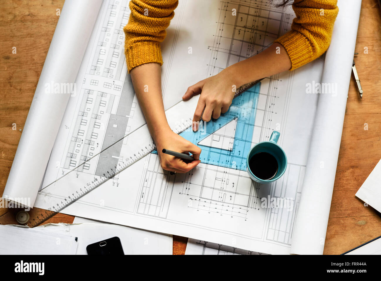 Top view of architect drawing on architectural project Stock Photo - Alamy