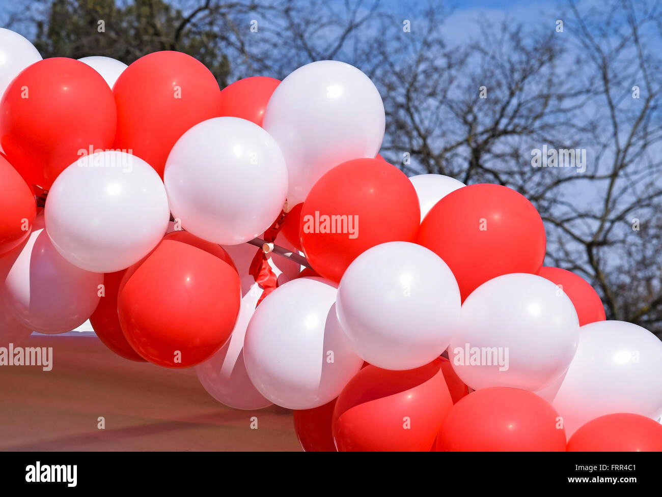 Red and white party balloons Stock Photo - Alamy