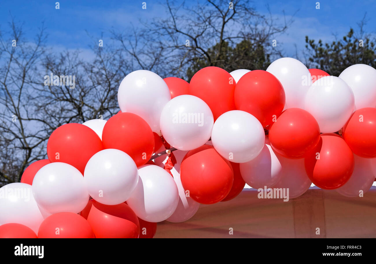 Red and white party balloons Stock Photo - Alamy