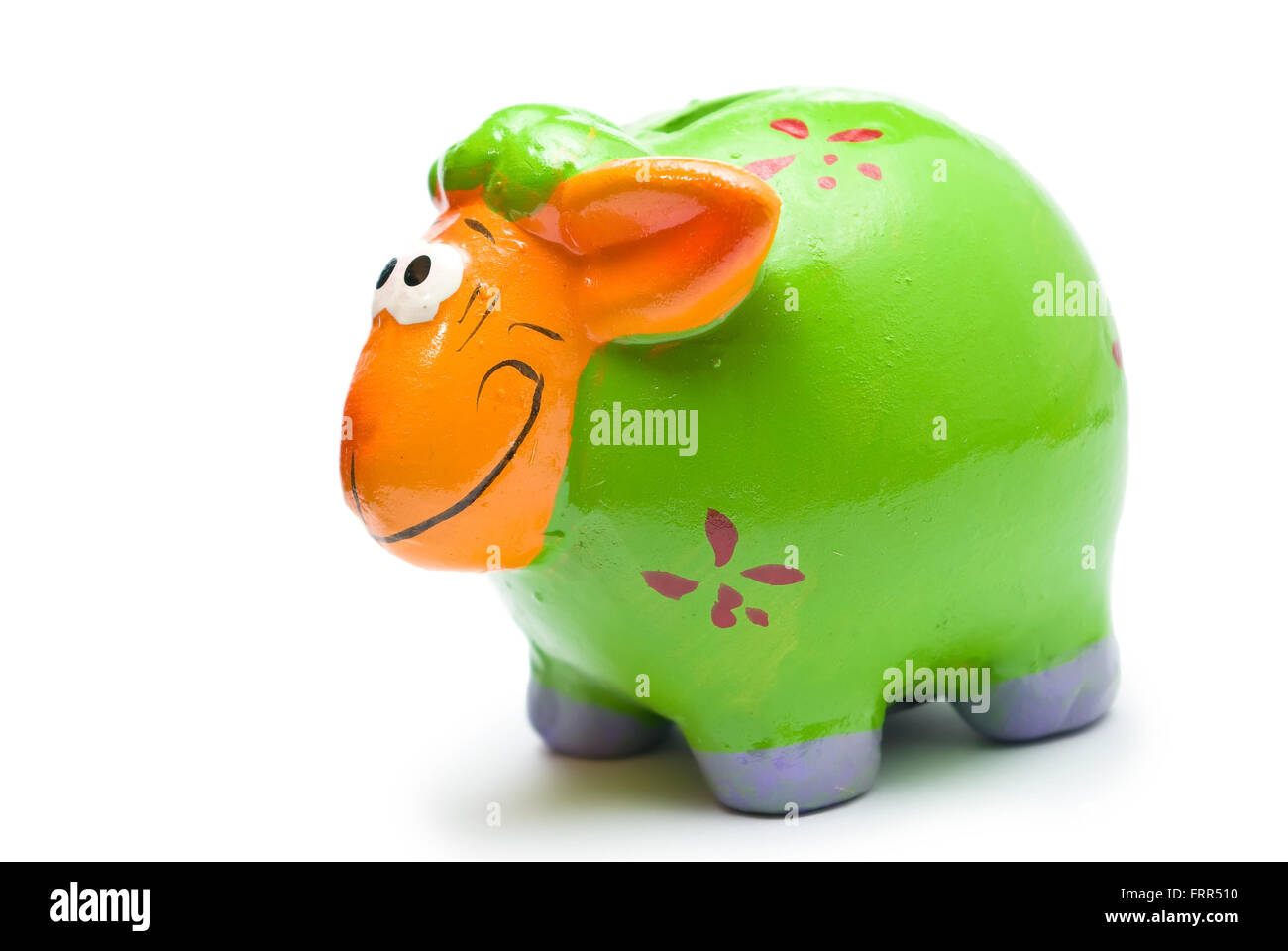 green piggy bank (sheep) isolated on white Stock Photo - Alamy