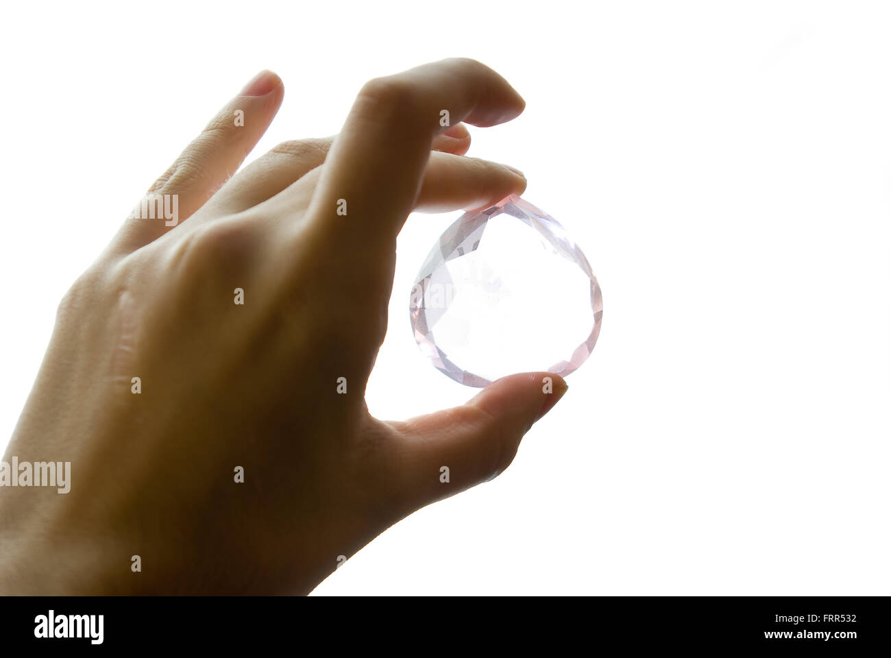 hand holding a gem, concept of examination of the jewl Stock Photo - Alamy