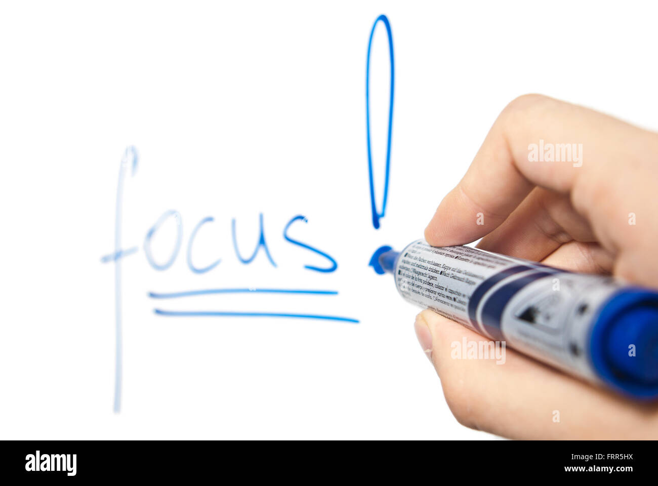 word focus written on whiteboard with selective focus on hand Stock ...