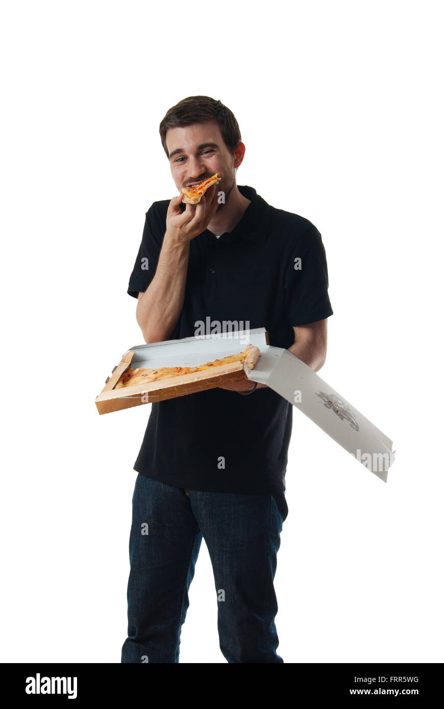 Young man eating pizza isolated on white Stock Photo - Alamy