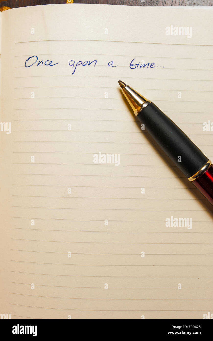 Begin writing the story with the phrase Once upon a time Stock Photo ...