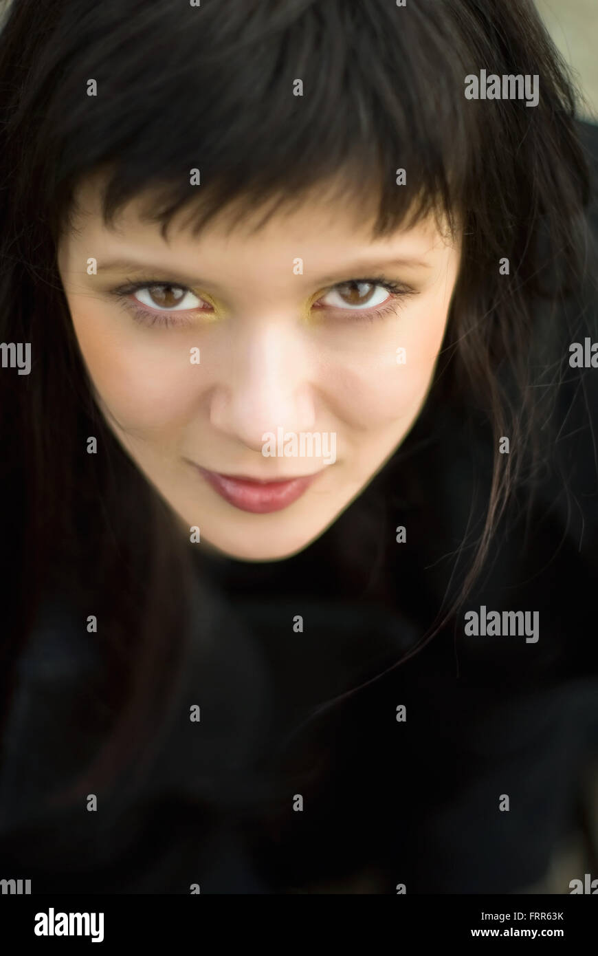 Portrait of a girl looking Stock Photo - Alamy