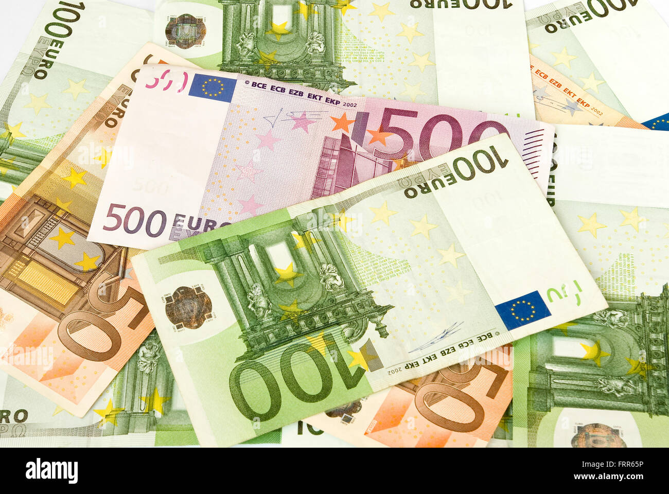pile of money containing euros Stock Photo - Alamy