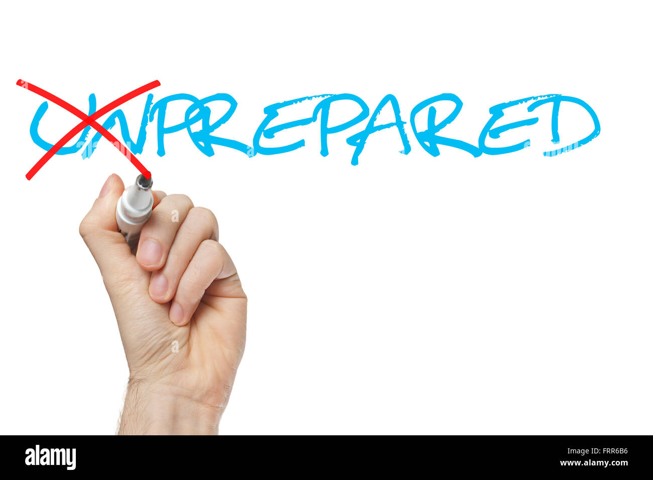 Hand turning the word Unprepared into Prepared with red marker isolated ...