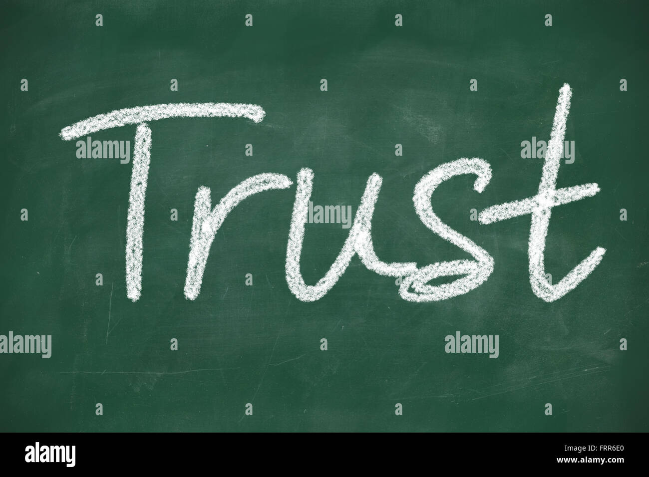 trust written with chalk on a blackboard Stock Photo - Alamy