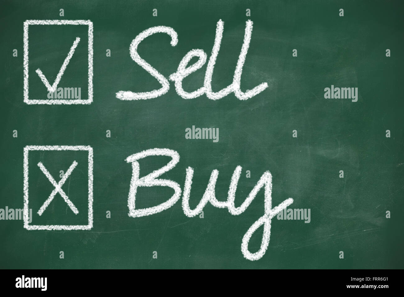 Sell and buy choice business concept on blackboard Stock Photo - Alamy