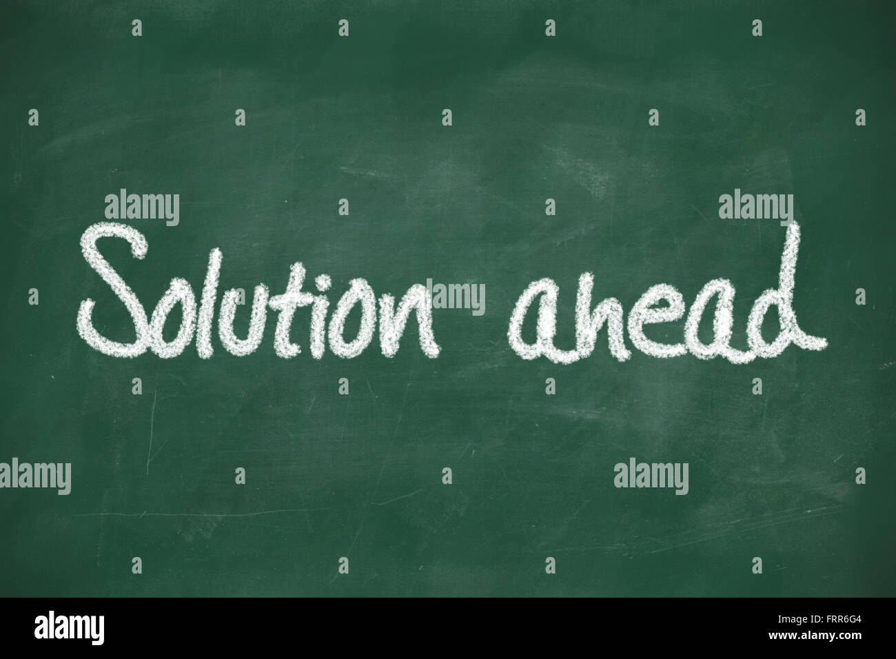 Solution ahead written with chalk on blackboard Stock Photo - Alamy