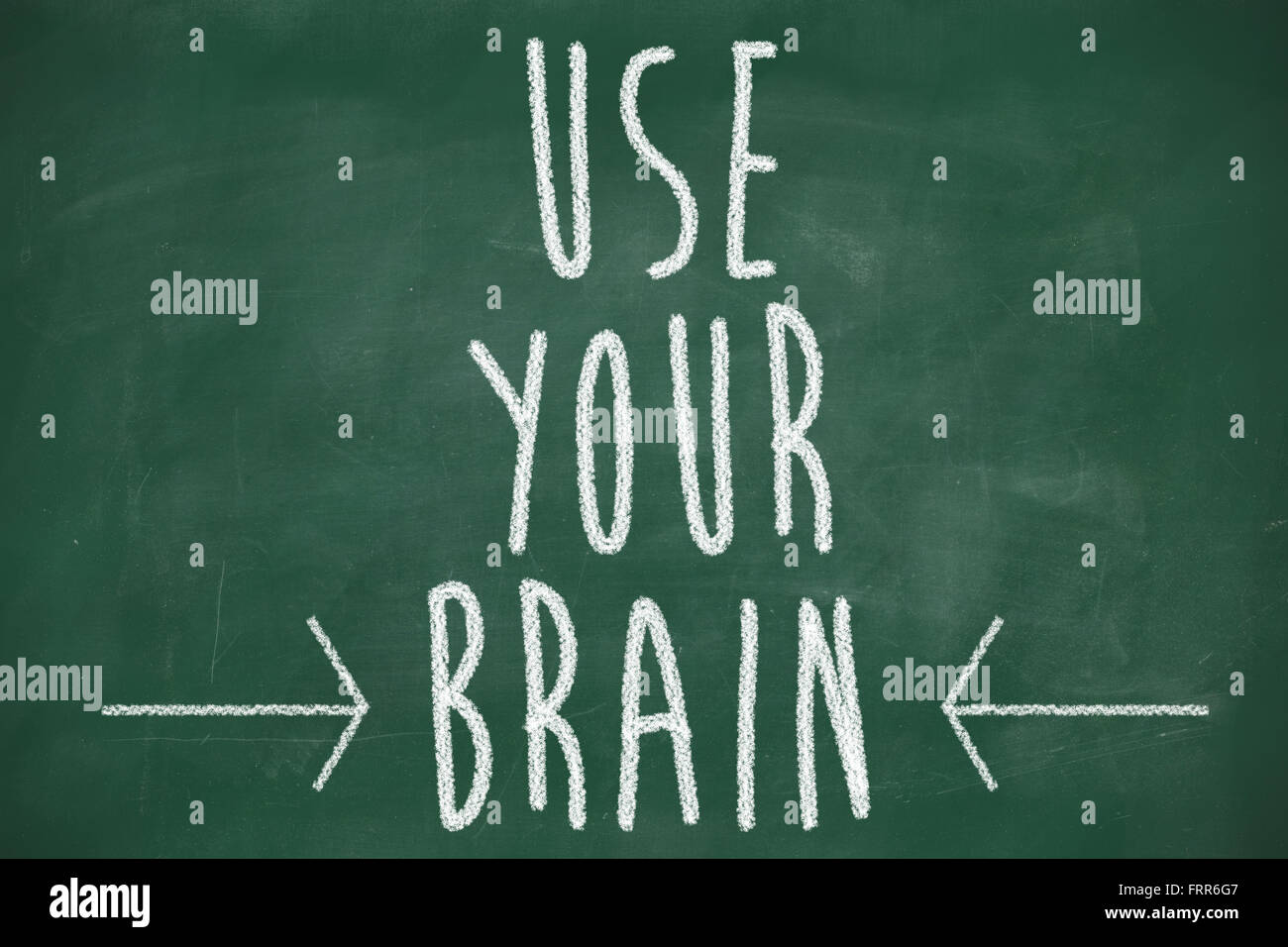 use your brain phrase handwritten on blackboard Stock Photo - Alamy
