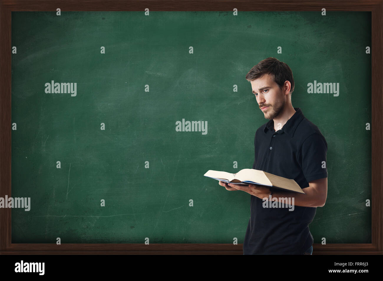 Young professor teaching in front of a blackboard Stock Photo - Alamy