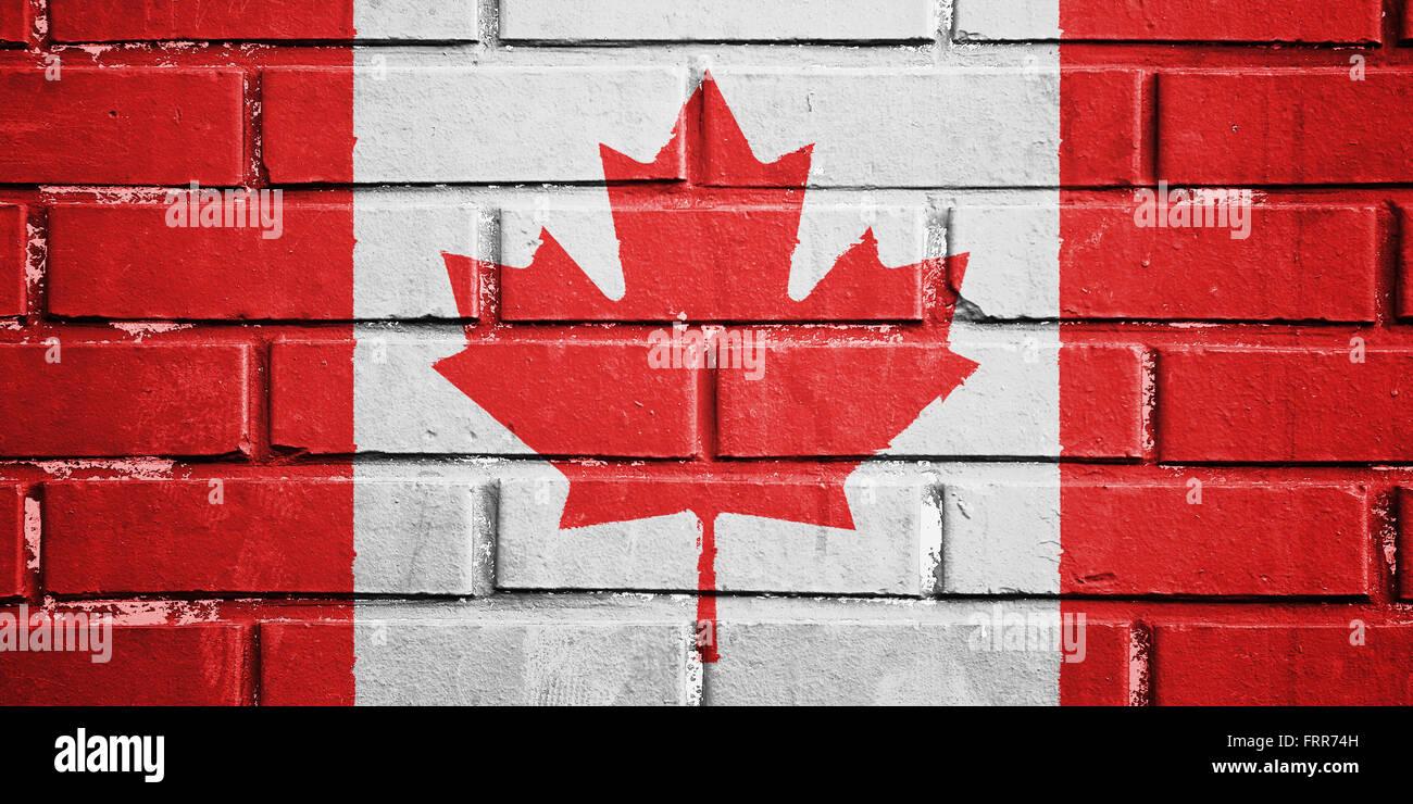 Canada flag on texture brick wall Stock Photo - Alamy