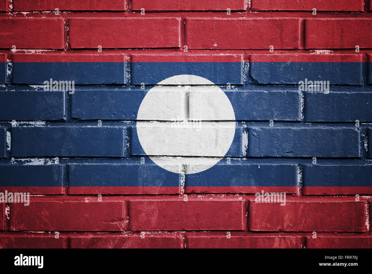 Laos flag on the brick wall Stock Photo - Alamy