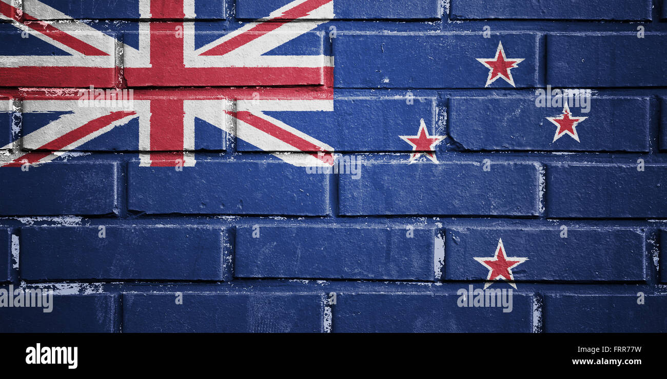 New Zealand flag on texture brick wall Stock Photo - Alamy