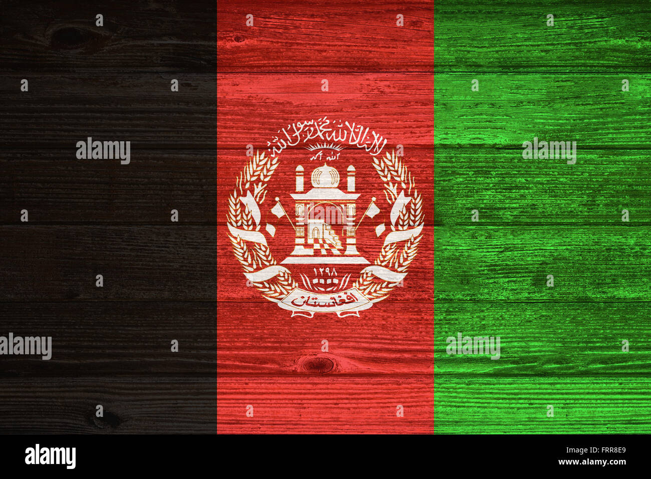 Afghanistan Flag painted on old wood plank background Stock Photo - Alamy