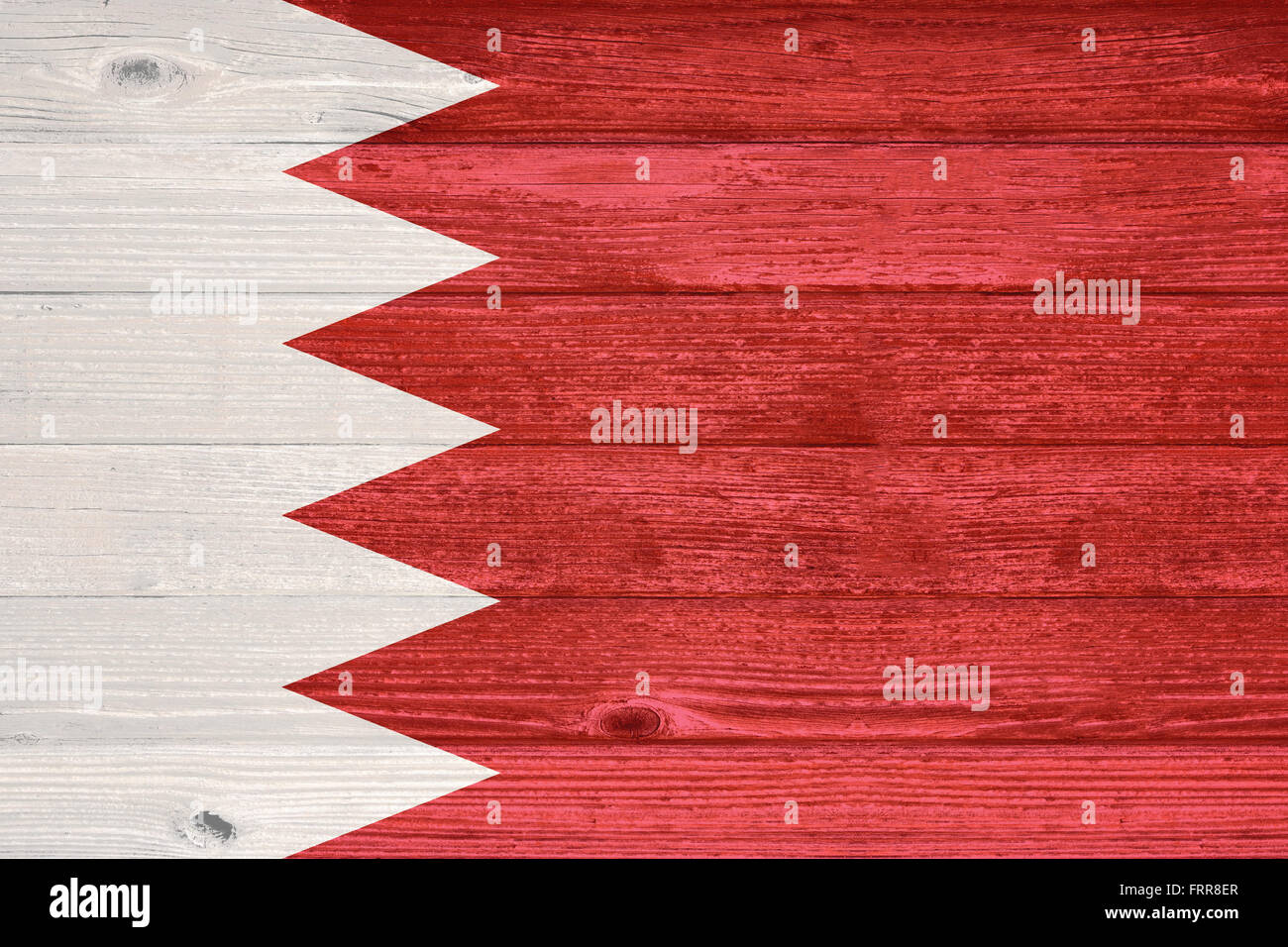 Bahrain Flag painted on old wood plank background Stock Photo - Alamy