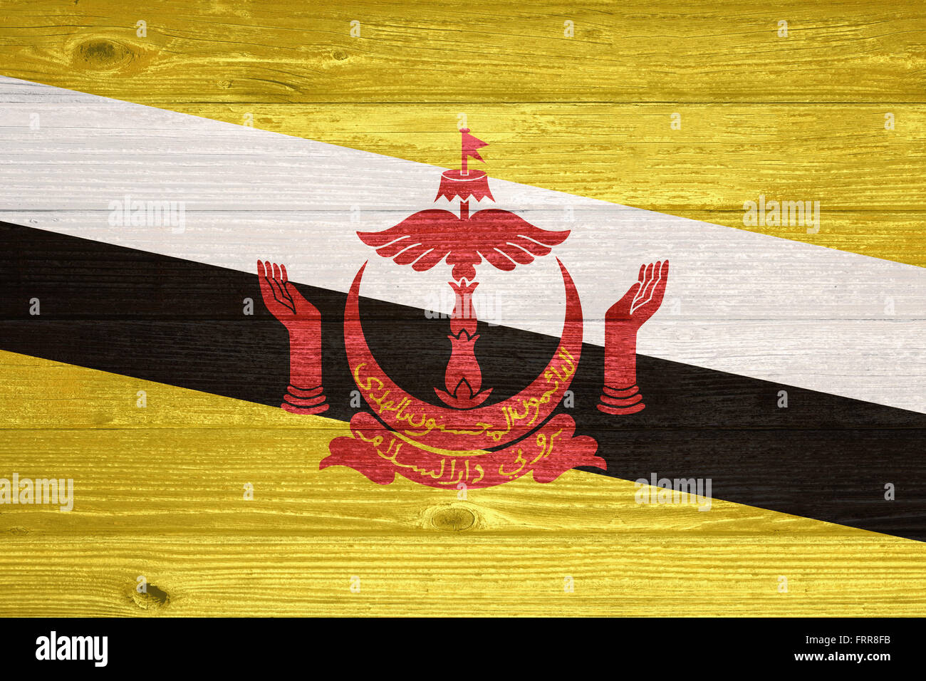 Brunei Flag painted on old wood plank background Stock Photo - Alamy