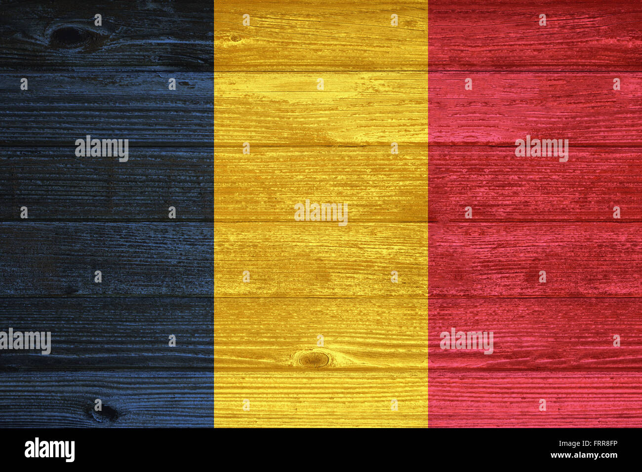Chad Flag painted on old wood plank background Stock Photo - Alamy