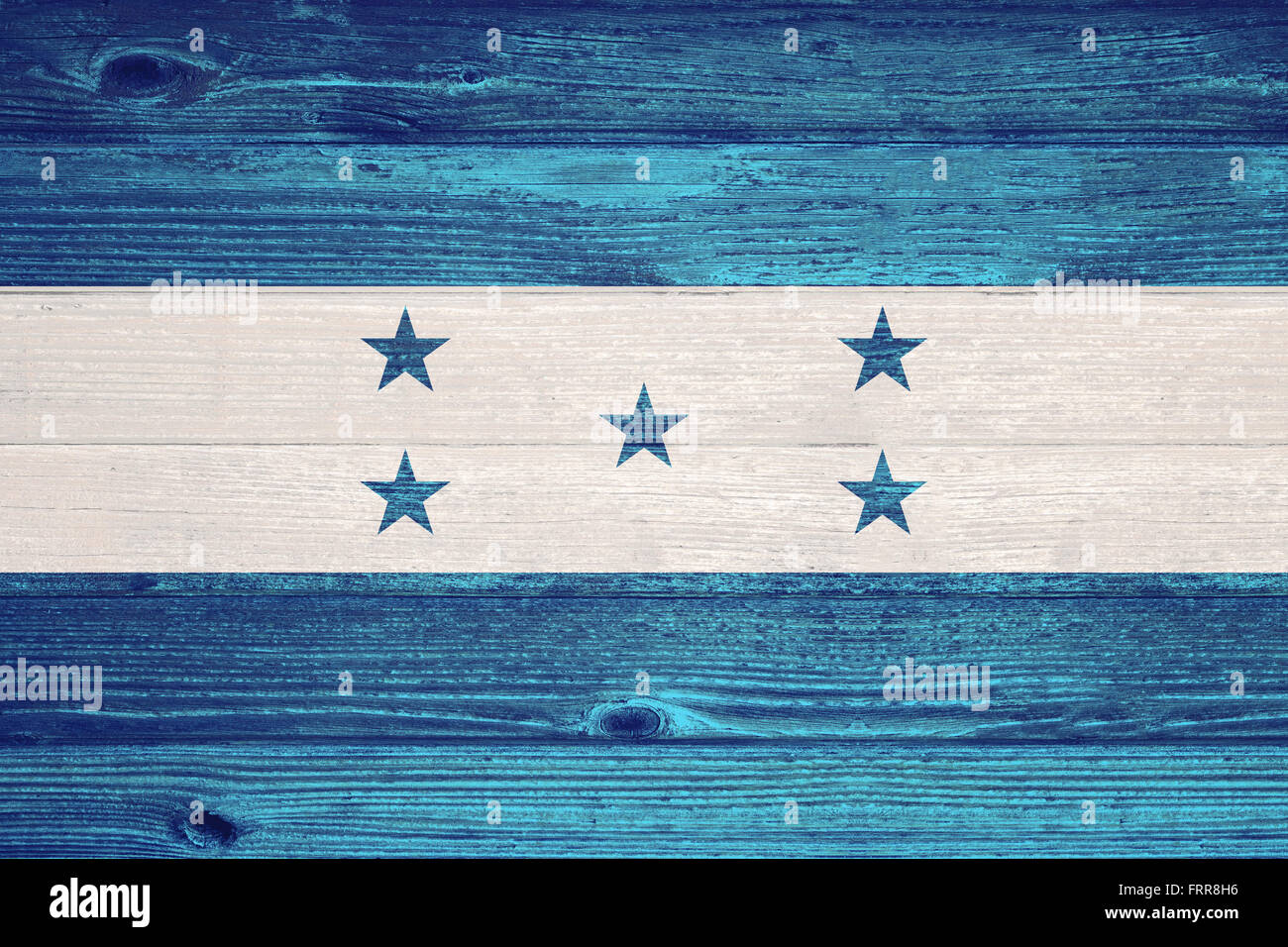 Honduras Flag painted on old wood plank background Stock Photo - Alamy