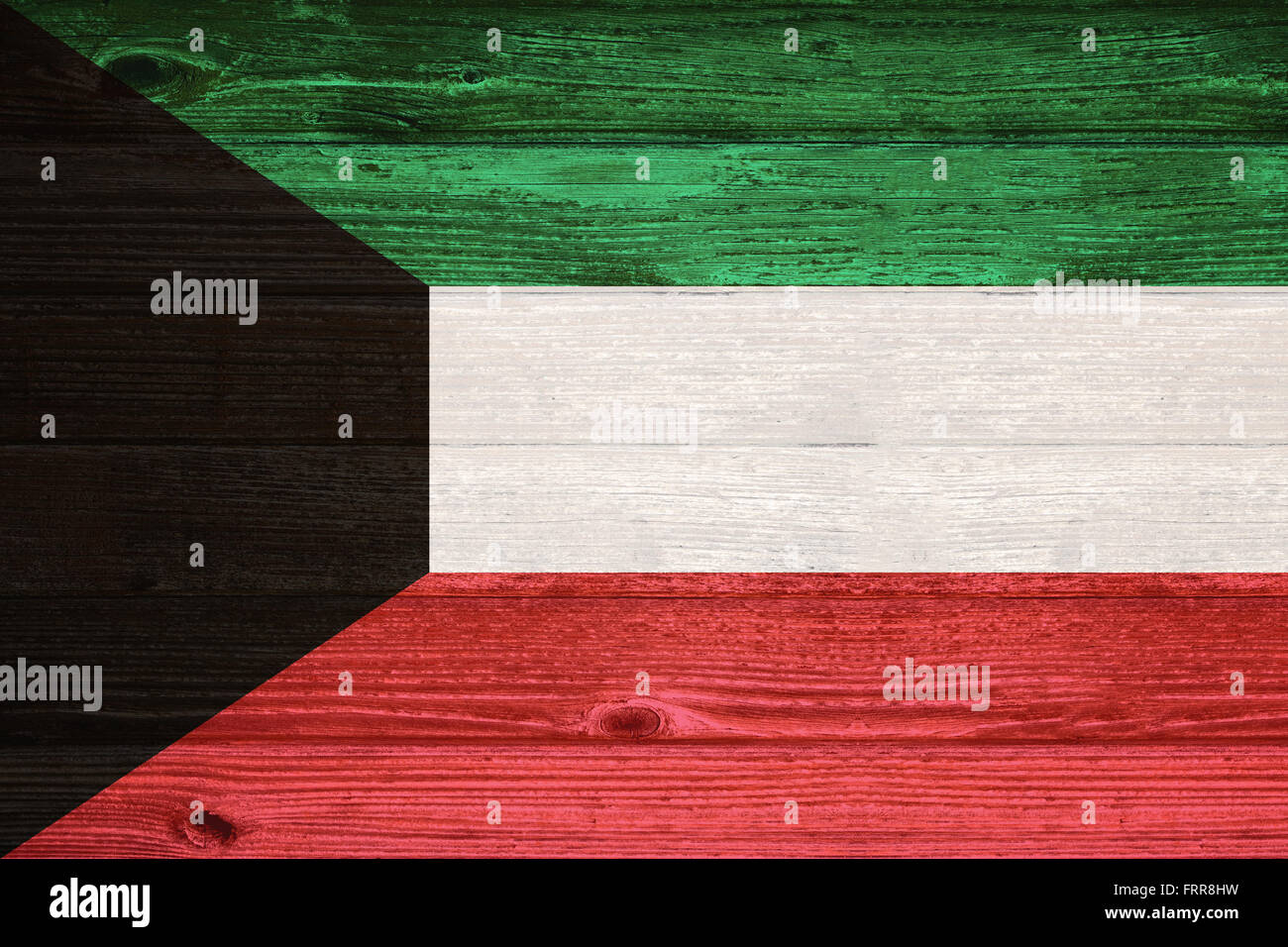 Kuwait Flag painted on old wood plank background Stock Photo - Alamy
