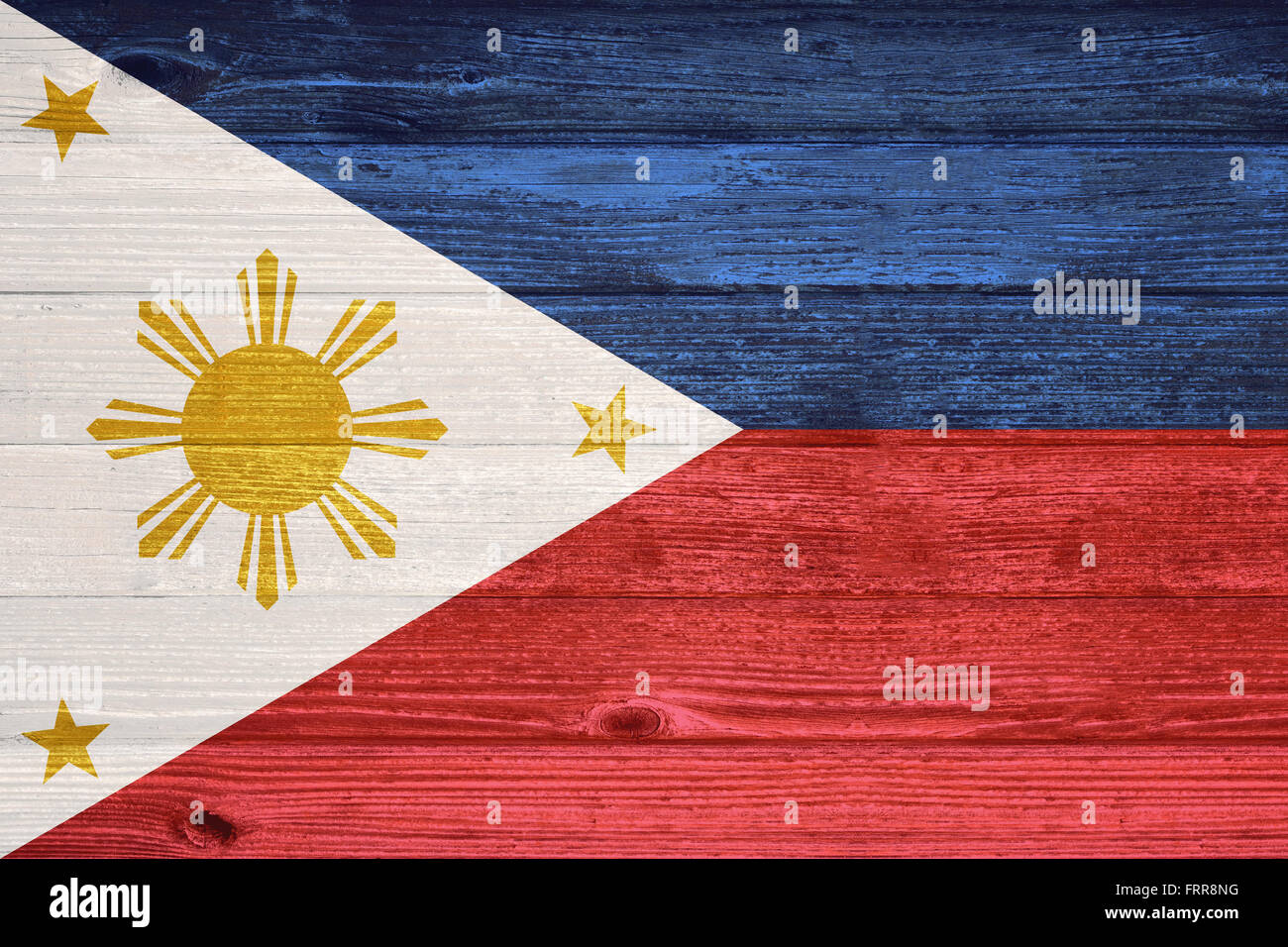 The Philippines Flag painted on old wood plank background Stock Photo ...