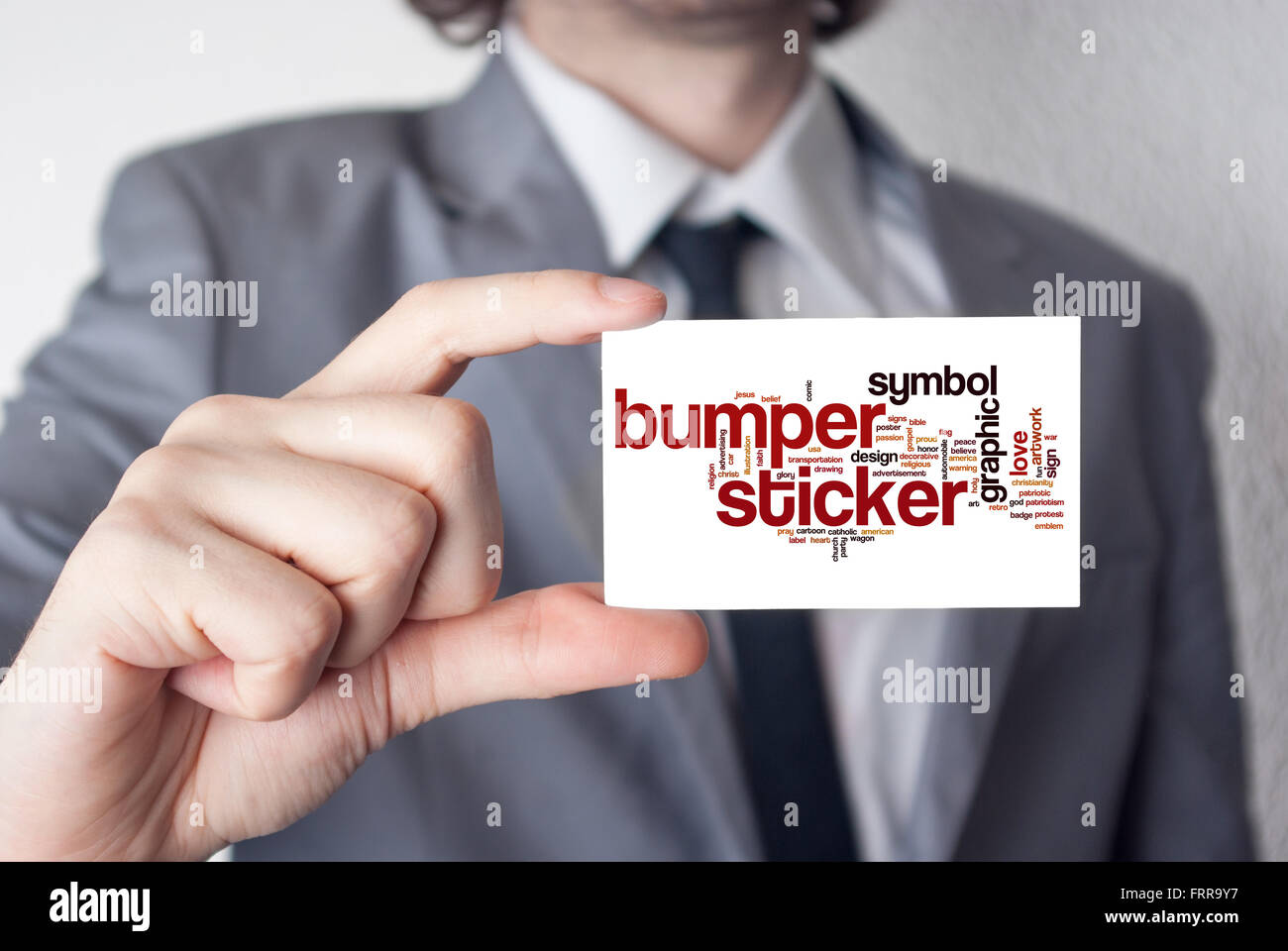Bumper sticker. Businessman in suit with a black tie showing or holding ...