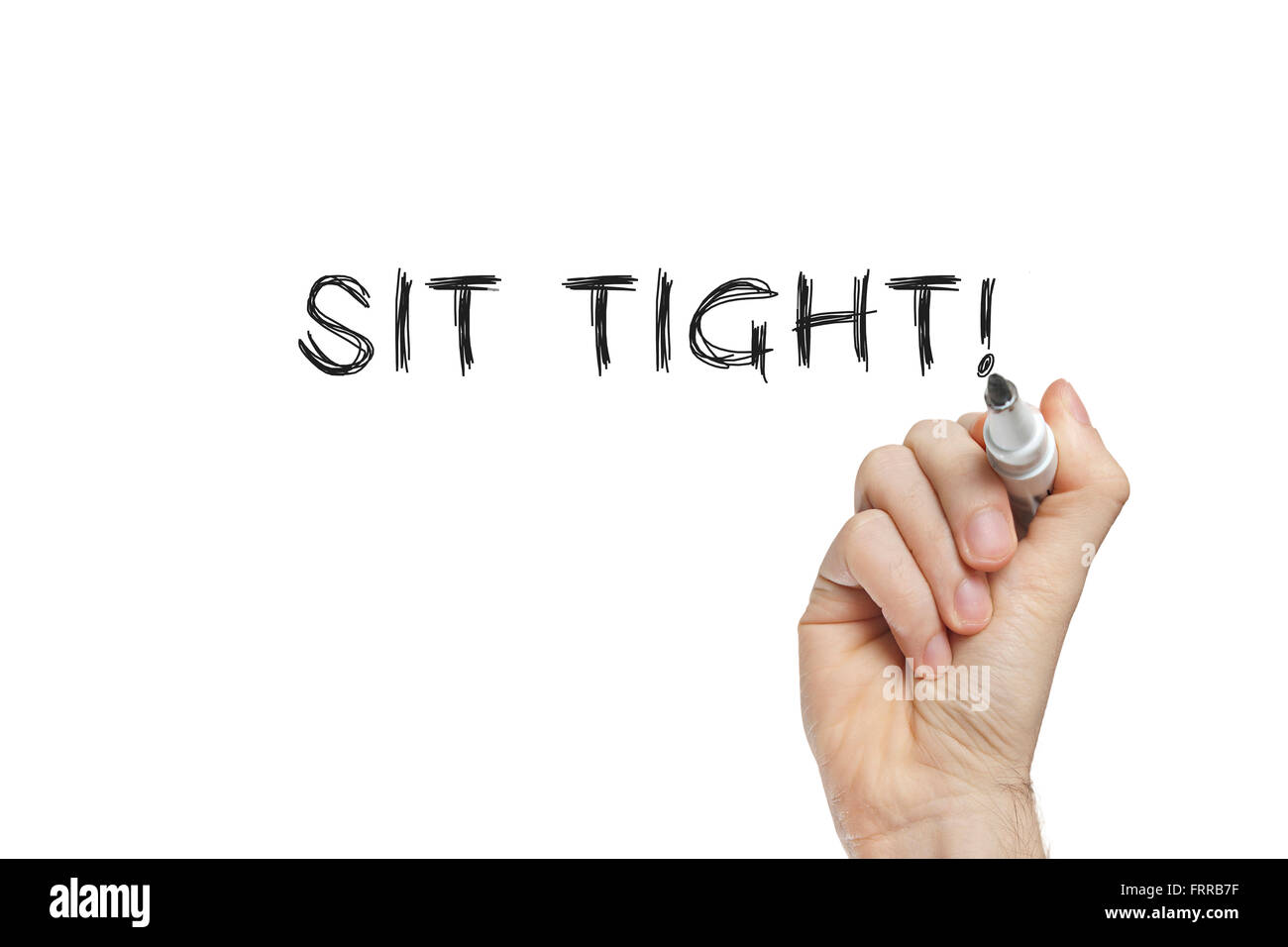 Hand writing sit tight on a white board Stock Photo - Alamy
