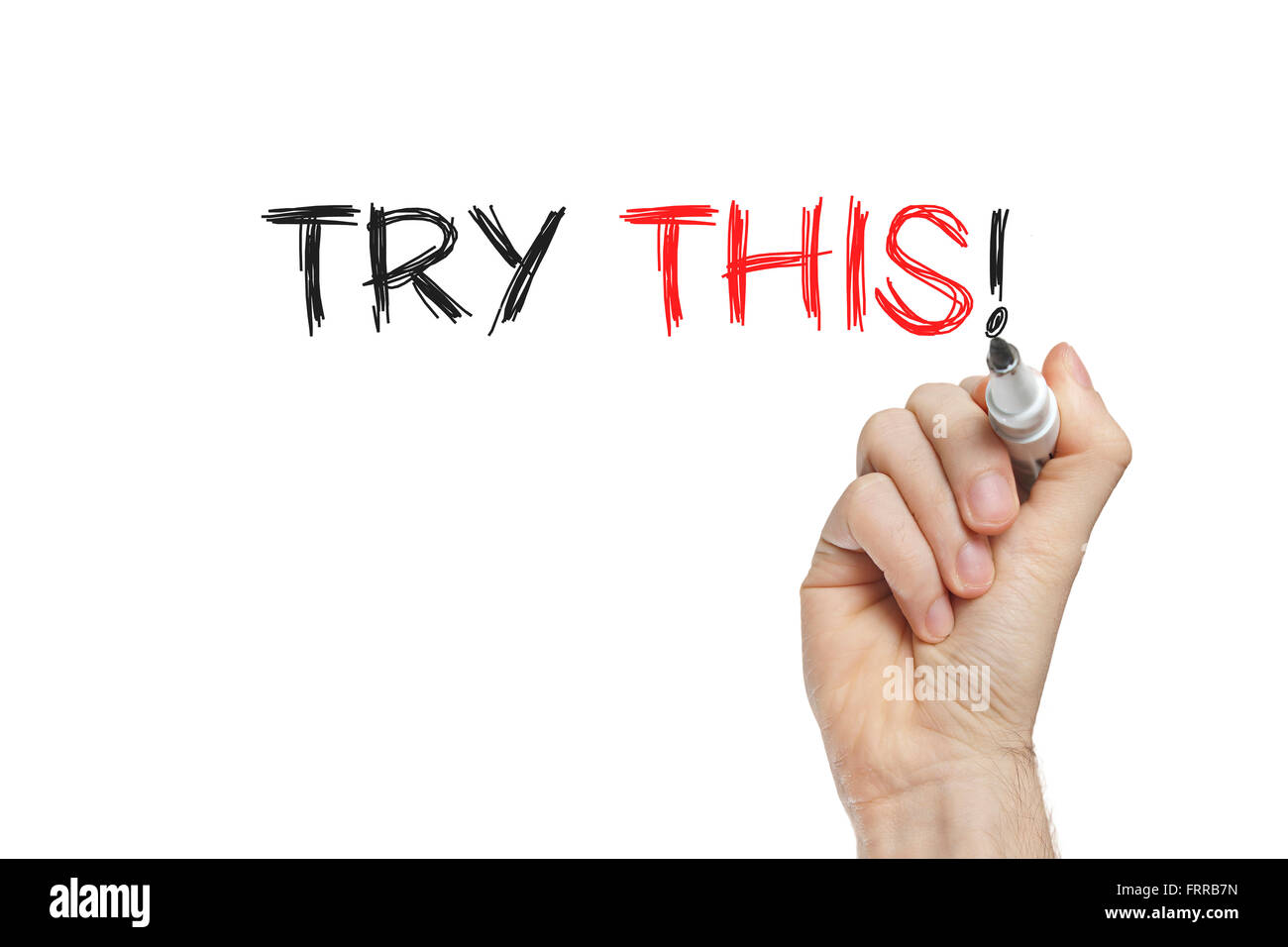 Hand writing try this on a white board Stock Photo - Alamy