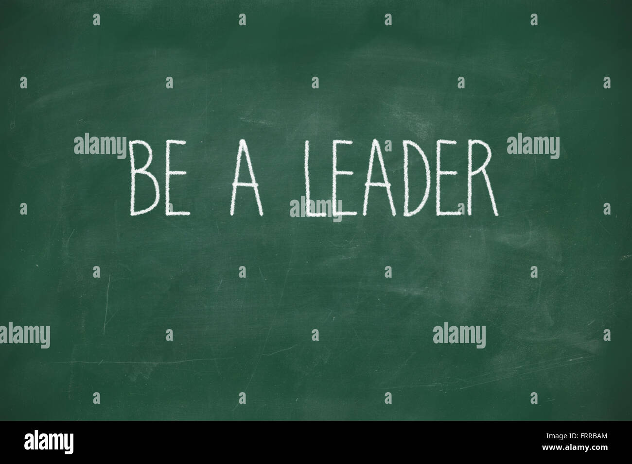 Be a leader handwritten on school blackboard Stock Photo - Alamy