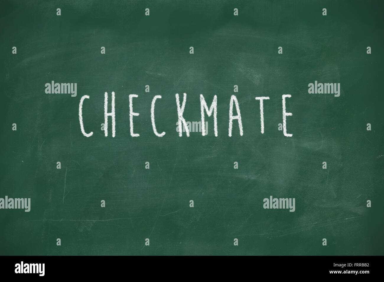 Checkmate handwritten on school blackboard Stock Photo - Alamy