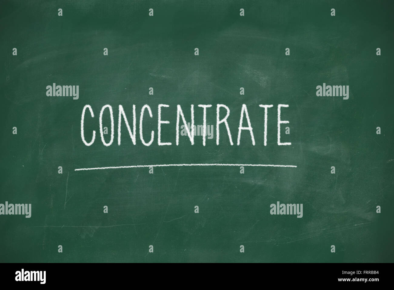 Concentrate handwritten on school blackboard Stock Photo - Alamy