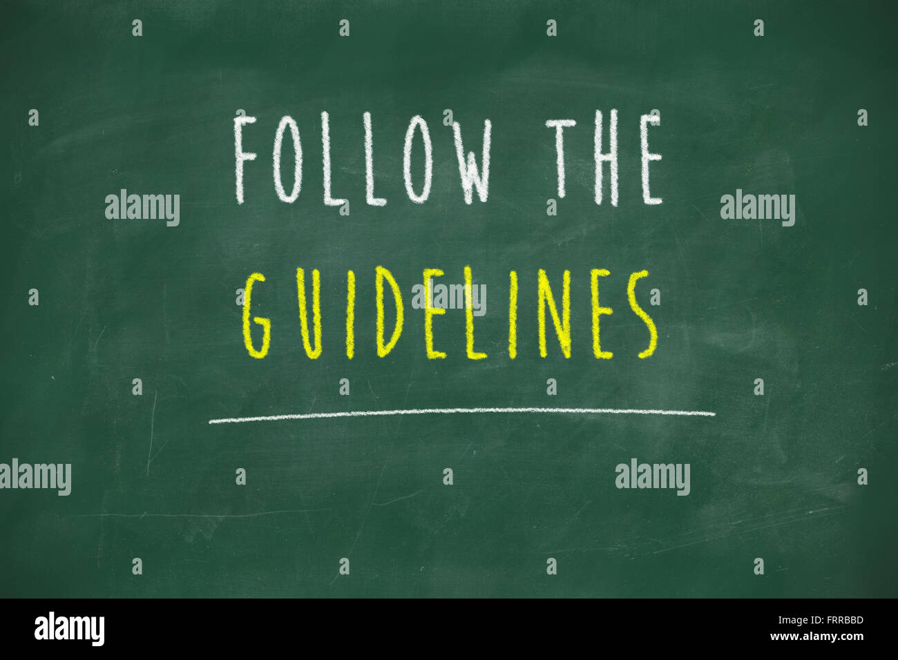 Follow the guidelines handwritten on school blackboard Stock Photo - Alamy