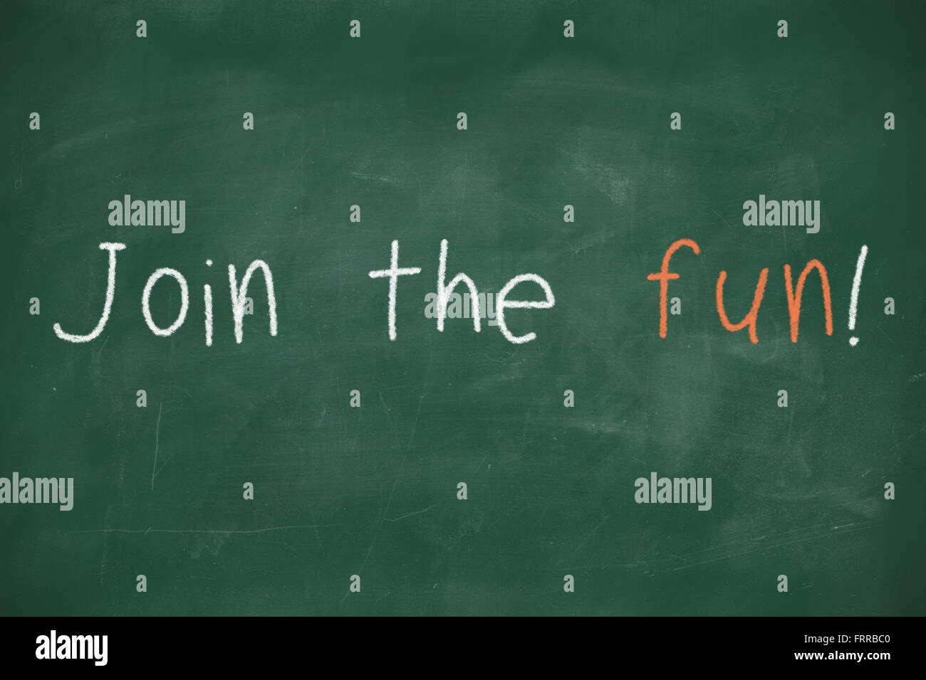 Join the fun handwritten on school blackboard Stock Photo - Alamy