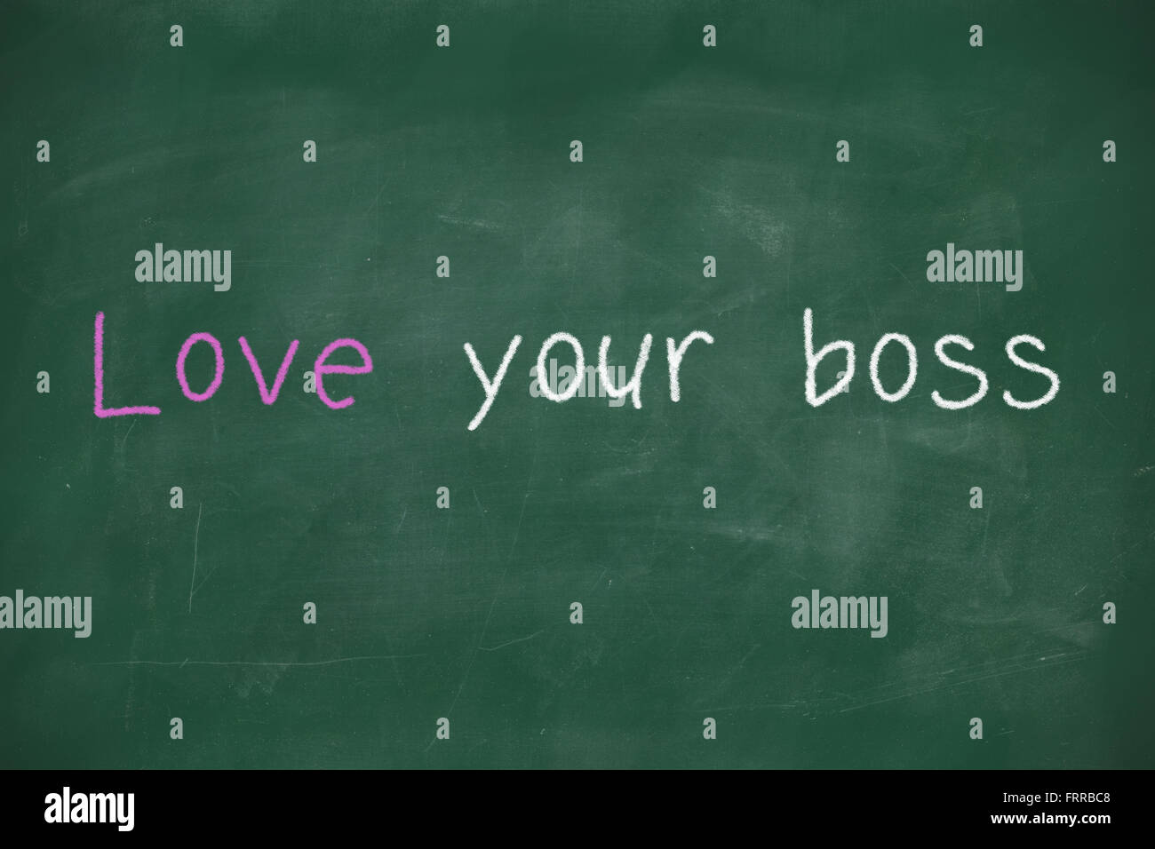 Love your bosshandwritten on school blackboard Stock Photo - Alamy