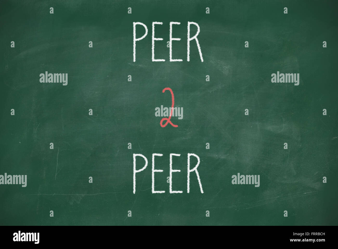 Peer 2 peerhandwritten on school blackboard Stock Photo - Alamy