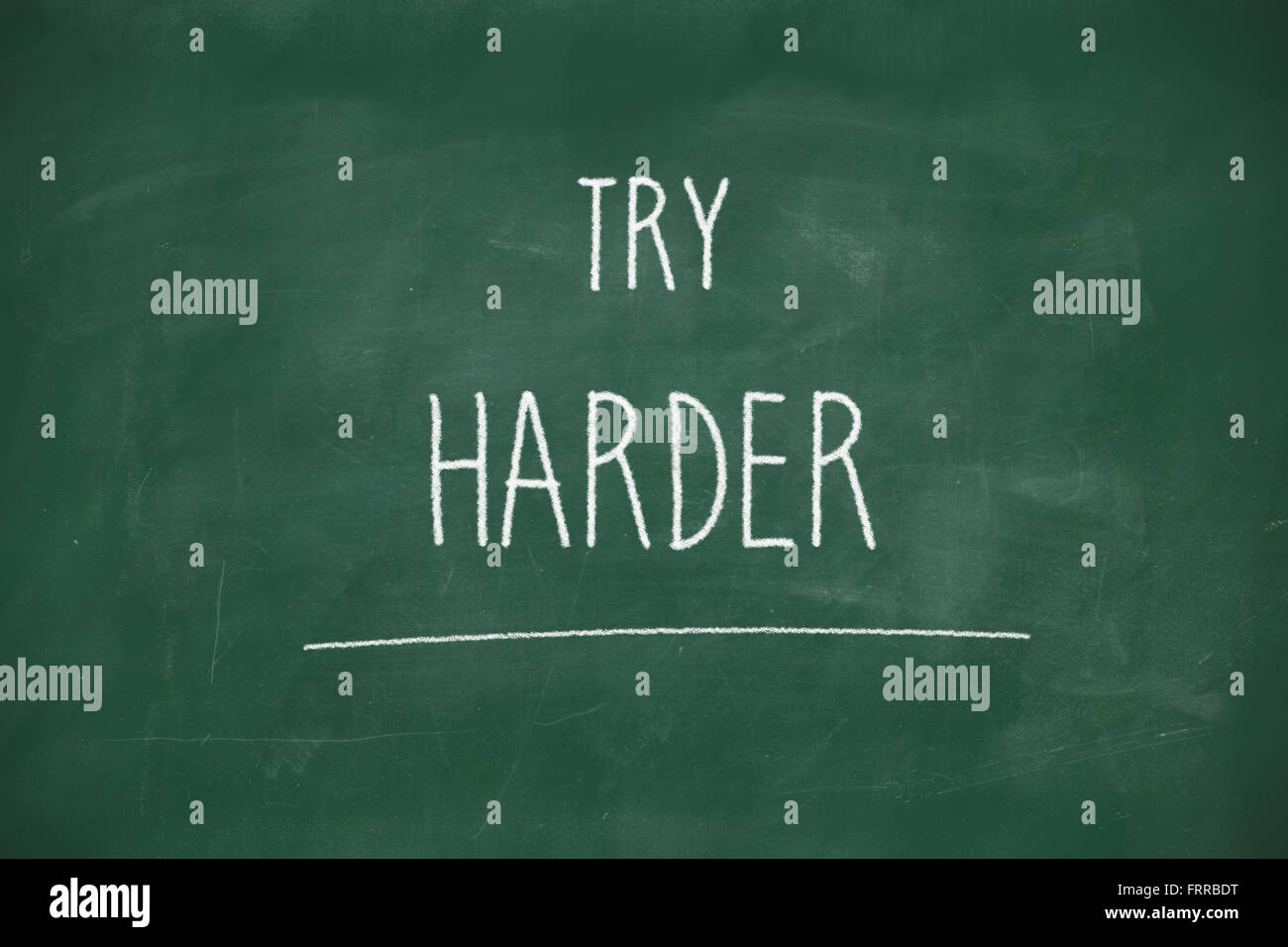 Try harder handwritten on school blackboard Stock Photo - Alamy