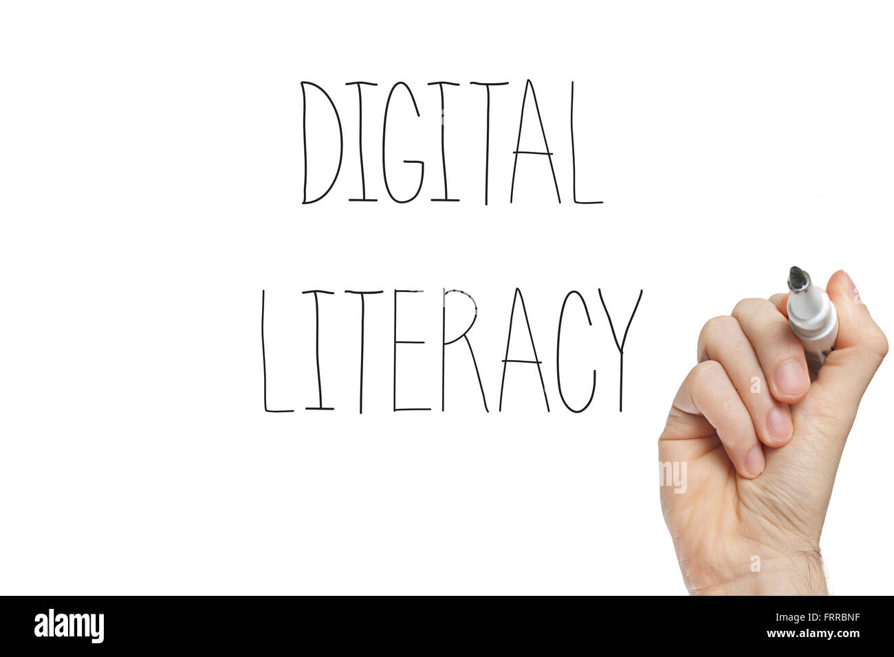 Hand writing digital literacy on a white board Stock Photo - Alamy