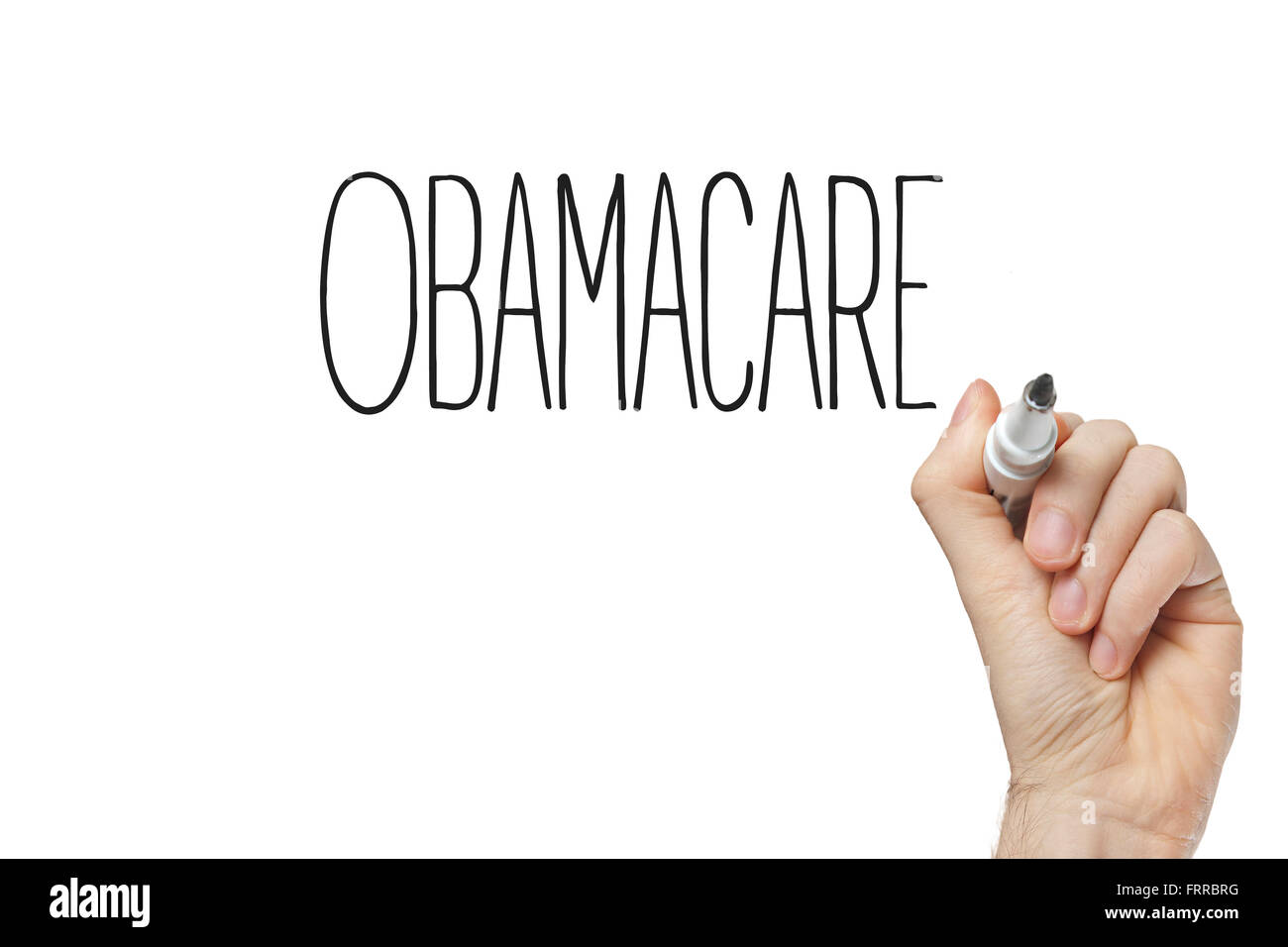 Hand writing obamacare on a white board Stock Photo - Alamy